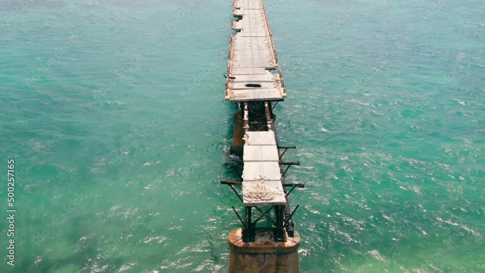 Broken bridge running over ocean surface in Florida Keys, USA. Above ...