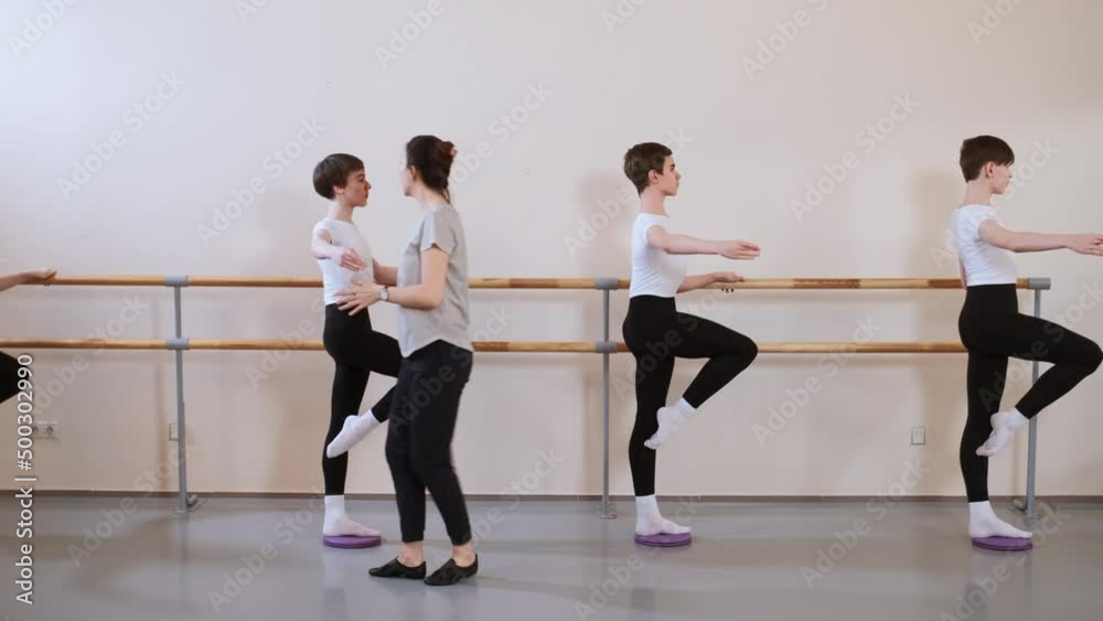 Teacher Choreographer Helps and Controls Group of Boys Students in ...