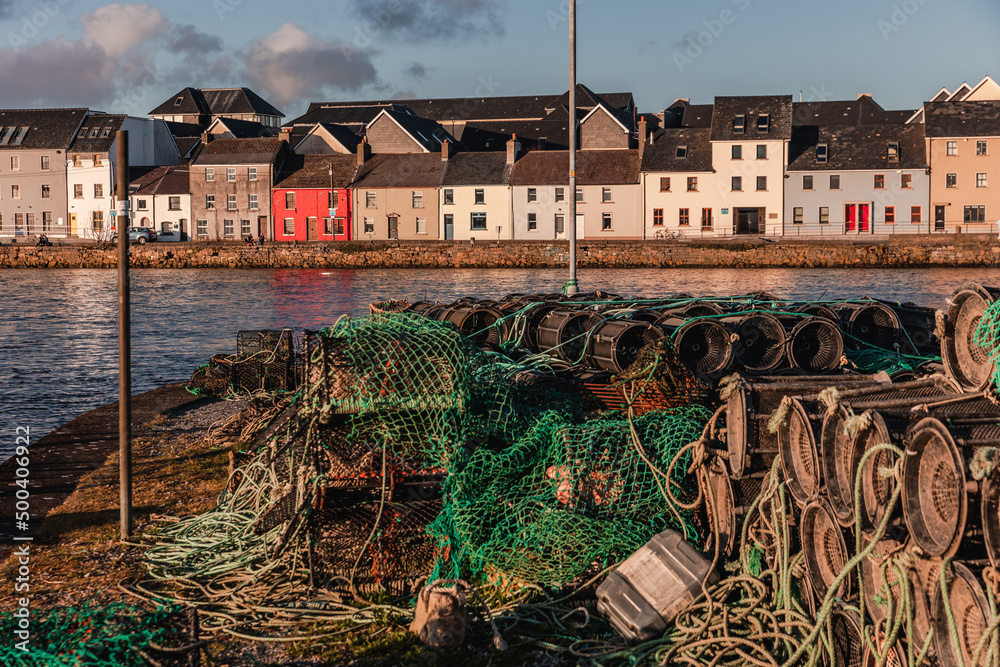 Old wooden shipwrecks in Claddagh Bay, Galway, sunny day in beautiful ...