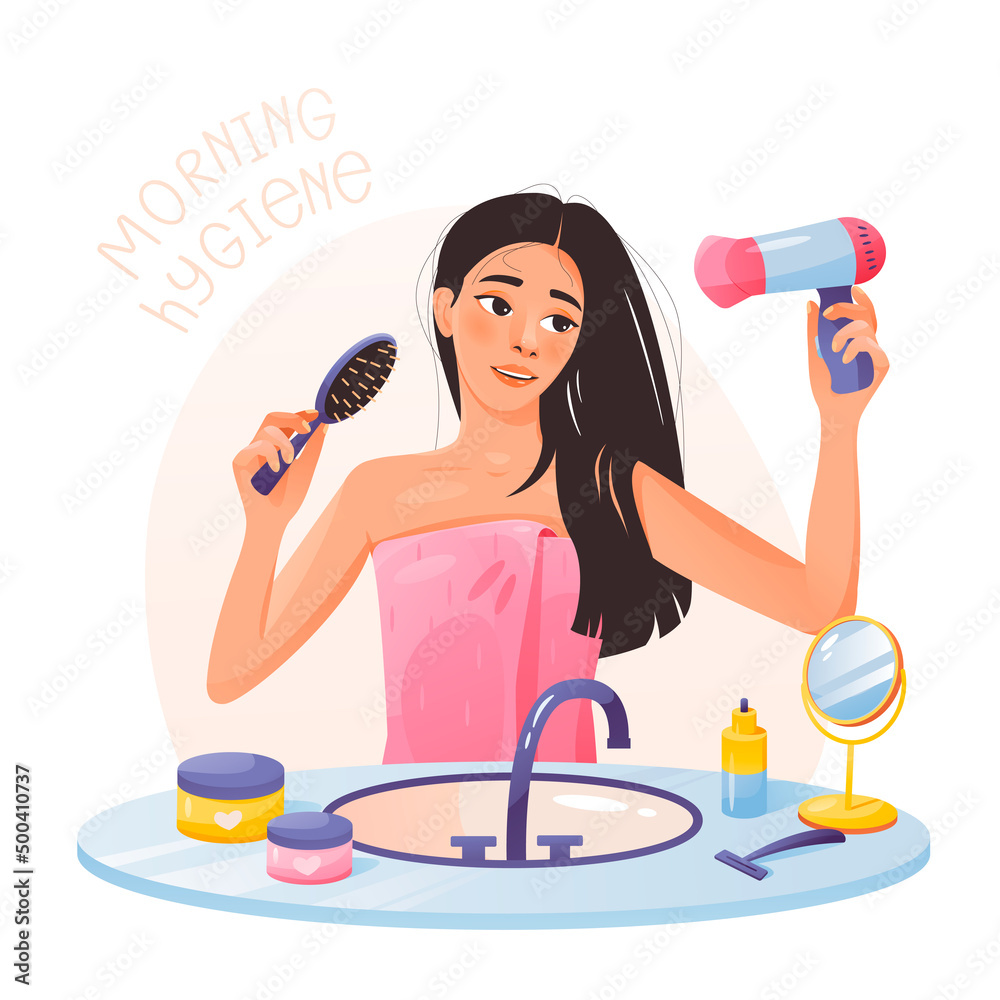 Morning hygiene collection. A young girl dries her hair with a hair ...