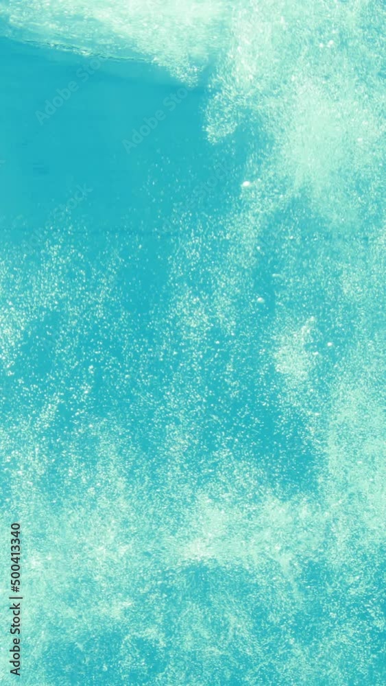Man diving into blue swimming pool Stock Video | Adobe Stock