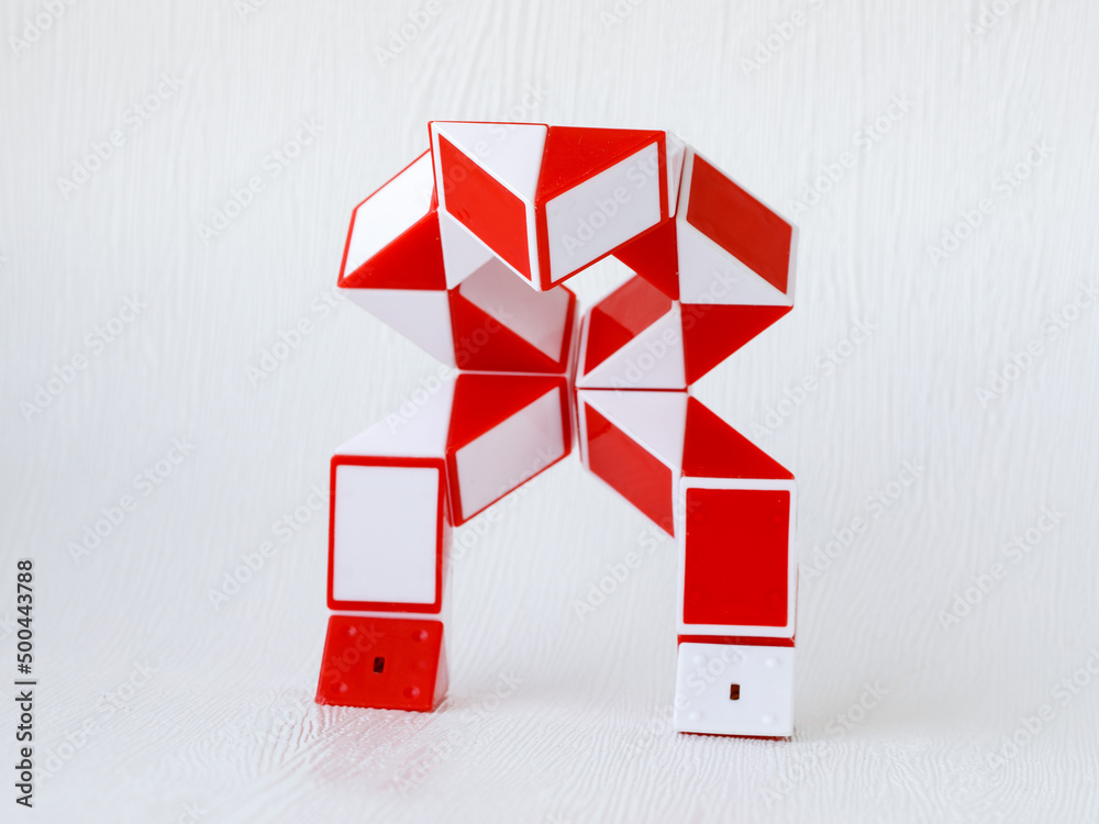 red and white bicolor magic snake Transformable twist puzzle in shape ...