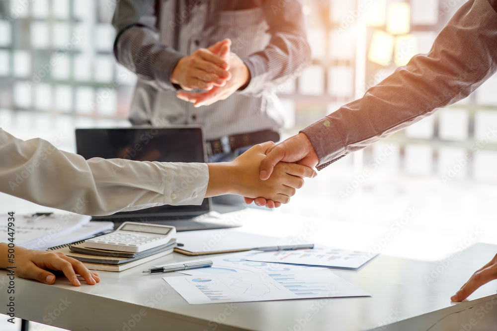 Handshake, Glad to work with you! Young modern men in smart casual wear ...