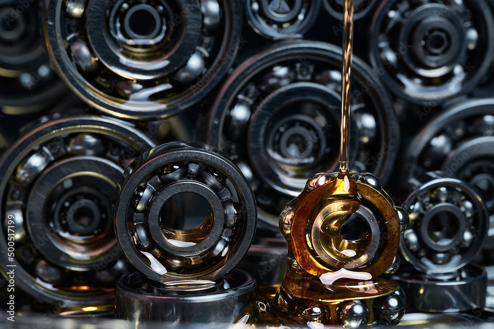 Lubricating oil. Ball bearing. Stock Photo | Adobe Stock