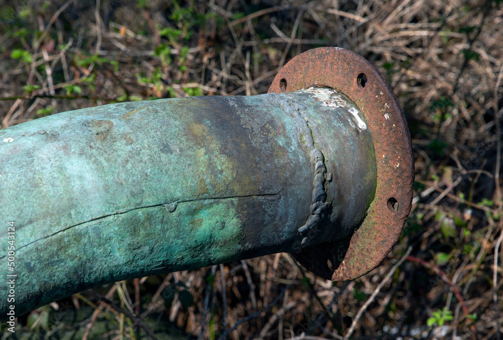 Copper pipe. At the junkyard. Perished agricultural history. Abandoned and rusted machinery ...