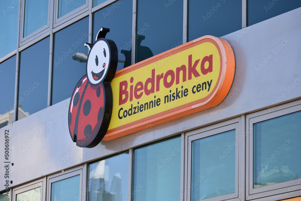 Biedronka logo, signage, symbol on the facade of popular discount ...
