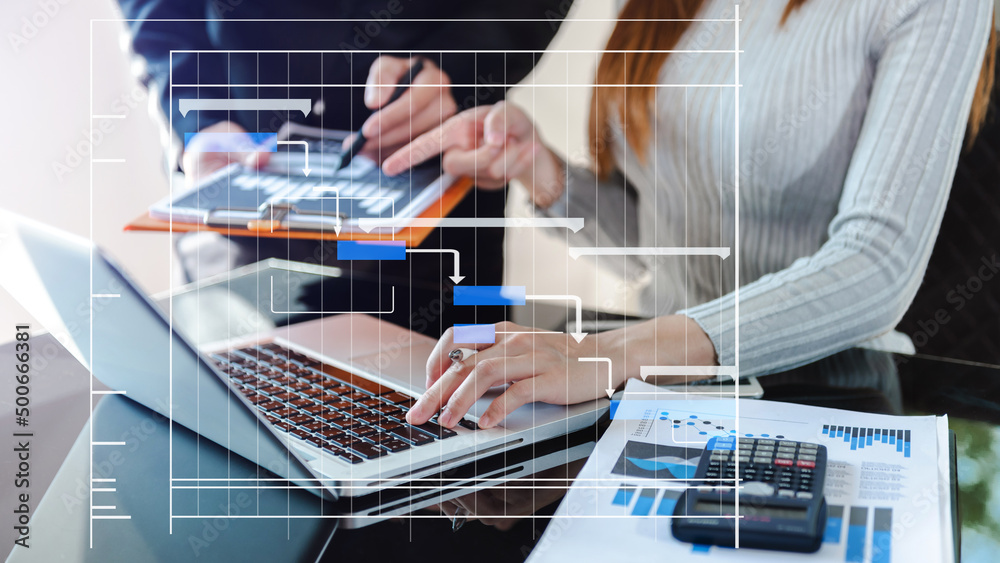 Project manager working and update tasks with milestones progress ...