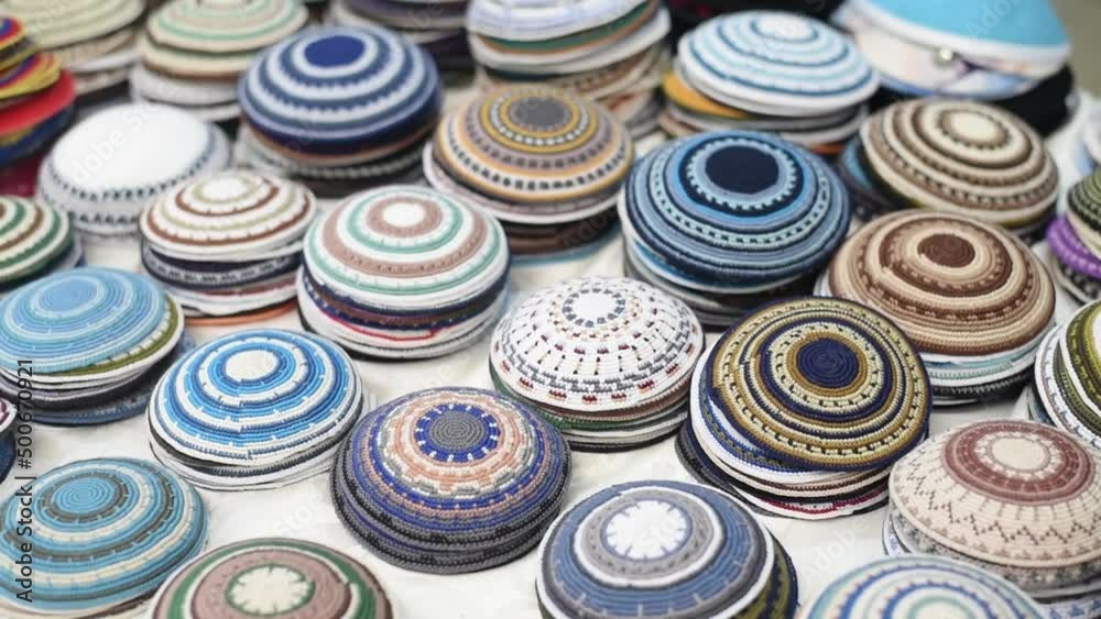 National religious hats for men - kippahs located on counter on store ...