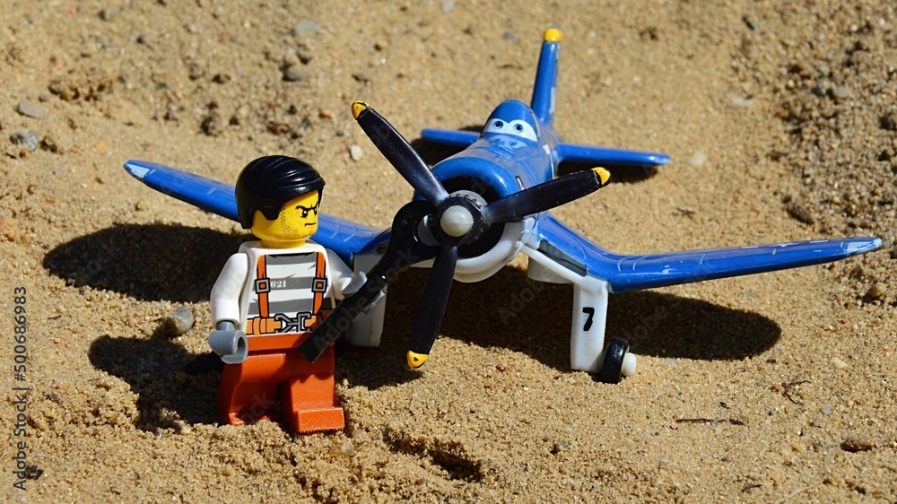 LEGO City figure of gloomy prisoner is tightening propeller of Vought ...