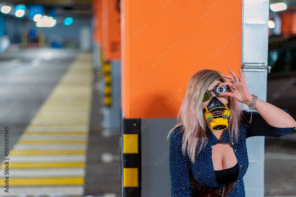 cyborg witch in cyberpunk goggles and a custom respirator, long dress ...