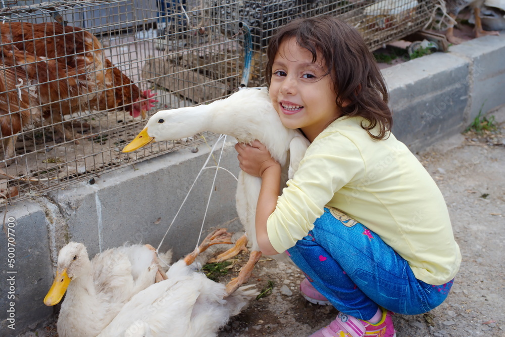 the lovable little girl's love of animals. She embraces geese sold in ...