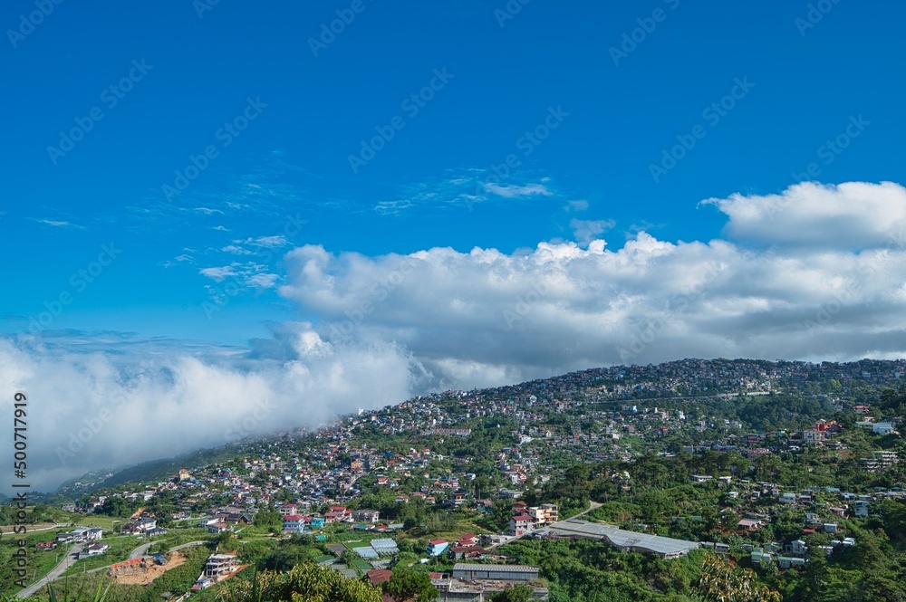 Highland landscape view of Baguio, Philippines with clouds in the blue ...