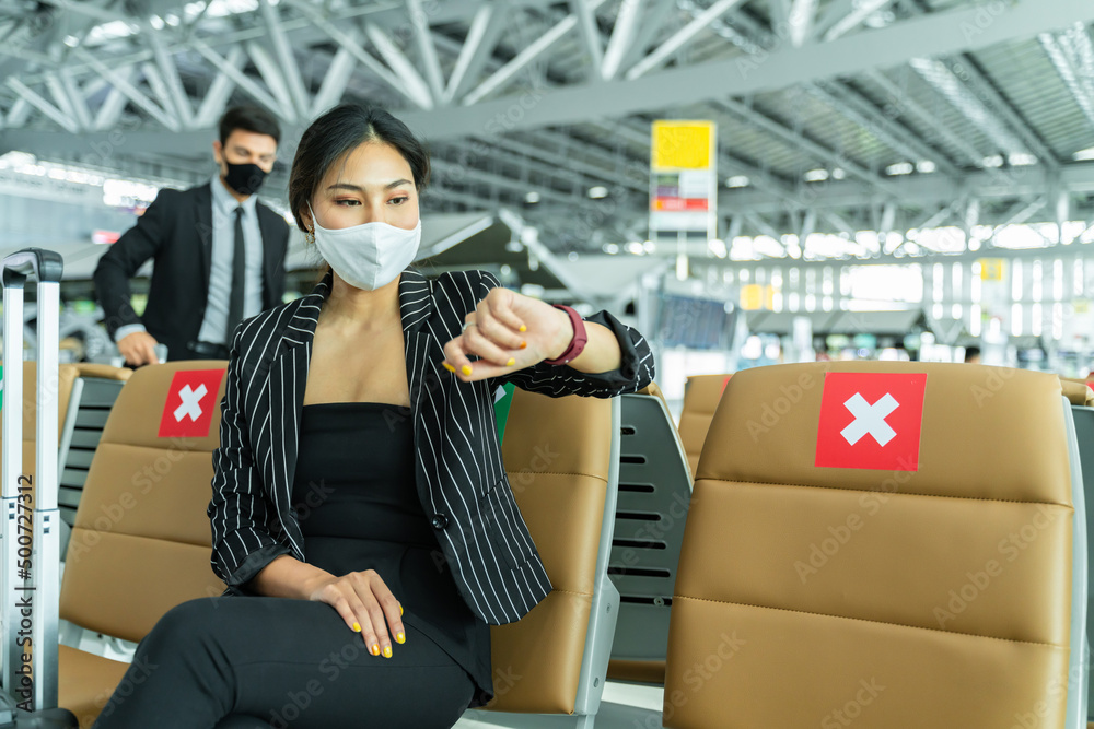 Social distancing and new normal concept.Man and woman sitting keeping ...