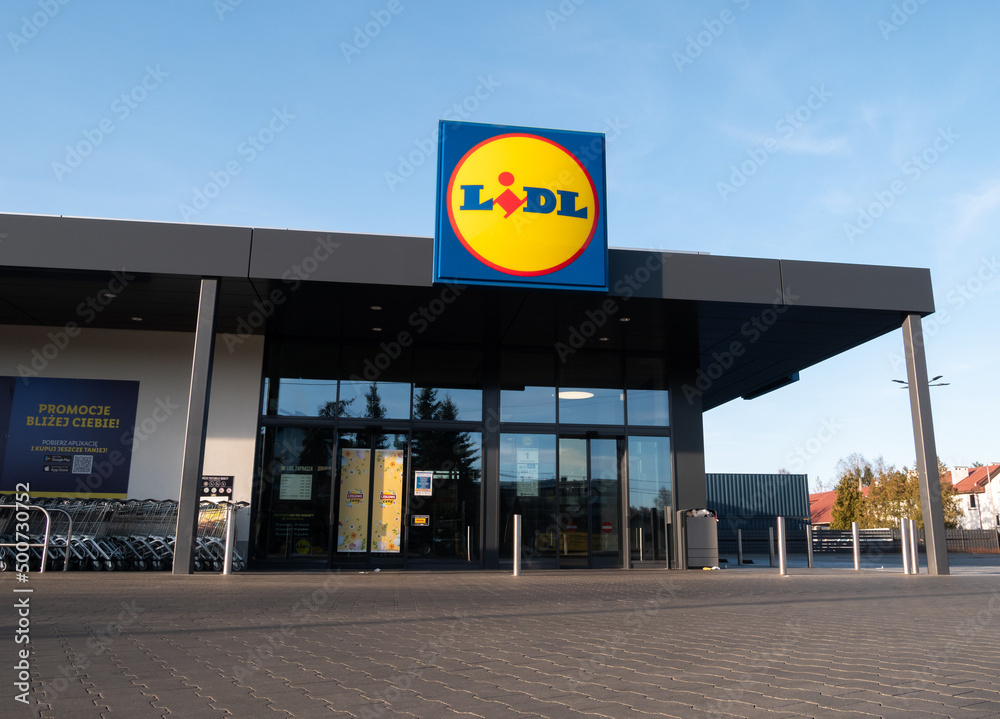 Lidl shop entrance, with brand logo signboard. German international ...