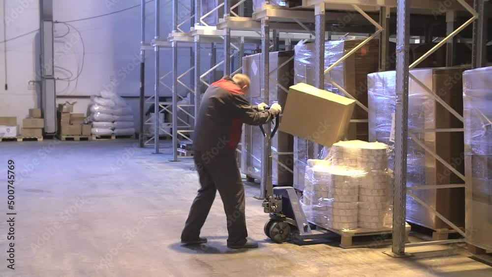 Stockvideo Injury at work. Warehouse worker lying unconscious on the ...