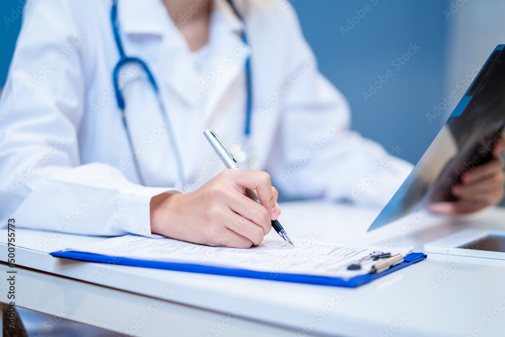 Medical healthcare Asian female attractive doctor showing x-ray film ...