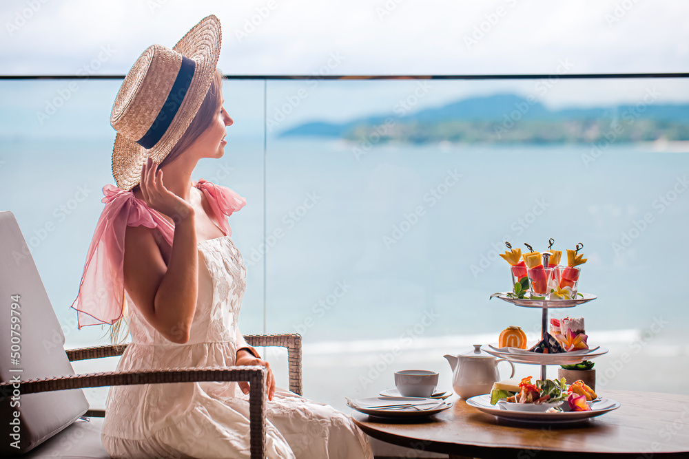 High class tea with selection of various desserts in luxury restaurant ...