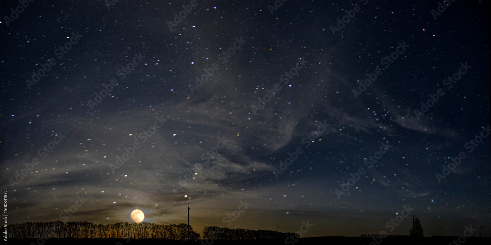 Panorama of night sky with clouds and stars. Moonlight. Stock Photo ...