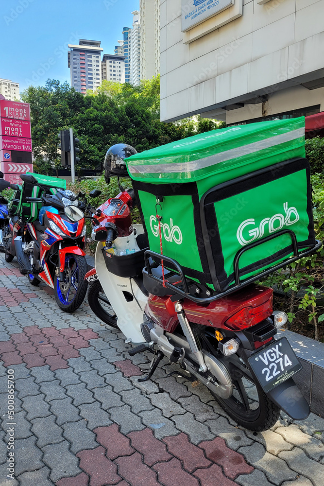 SELANGOR, MALAYSIA - 28 FEB 2022: View of GrabFood Motorcycles parking ...