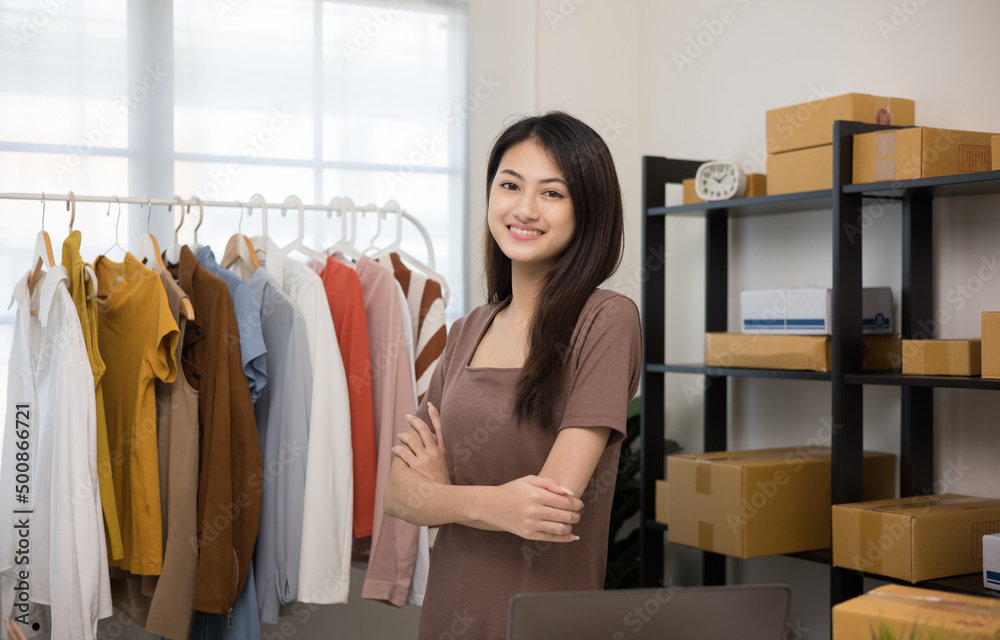 Happy Young beautiful asian woman business owner at fashion store check ...