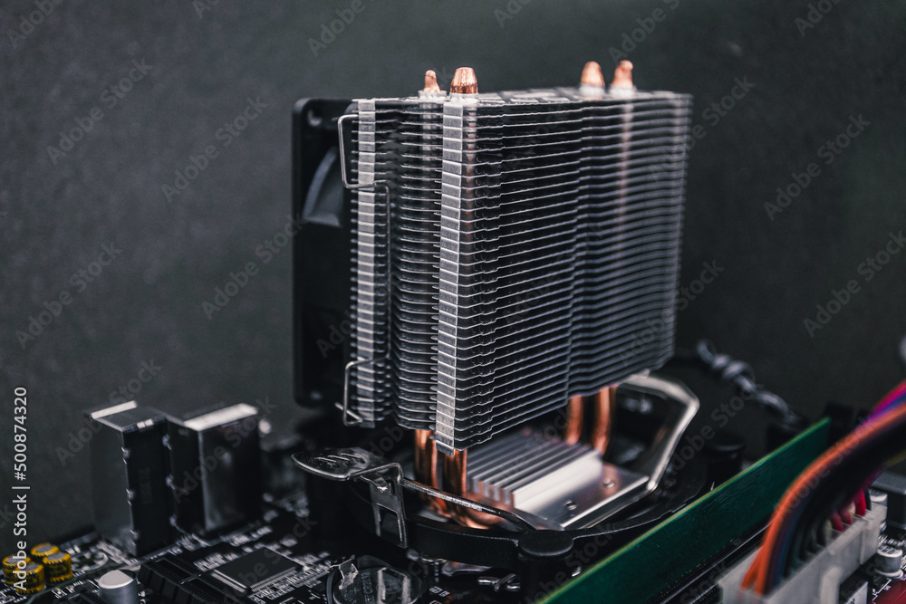 cooled heatsink on a desktop CPU covered with heatsink paste. Air ...