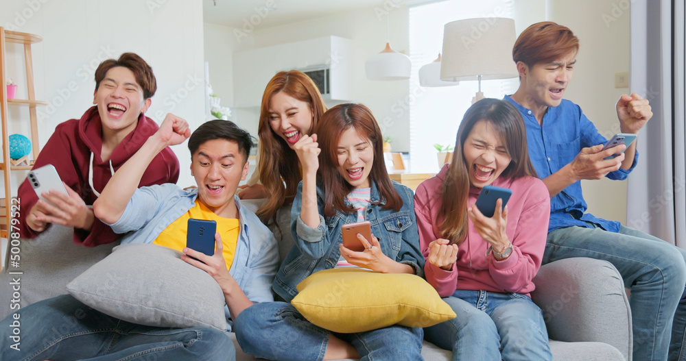 friends play phone games Stock Photo | Adobe Stock