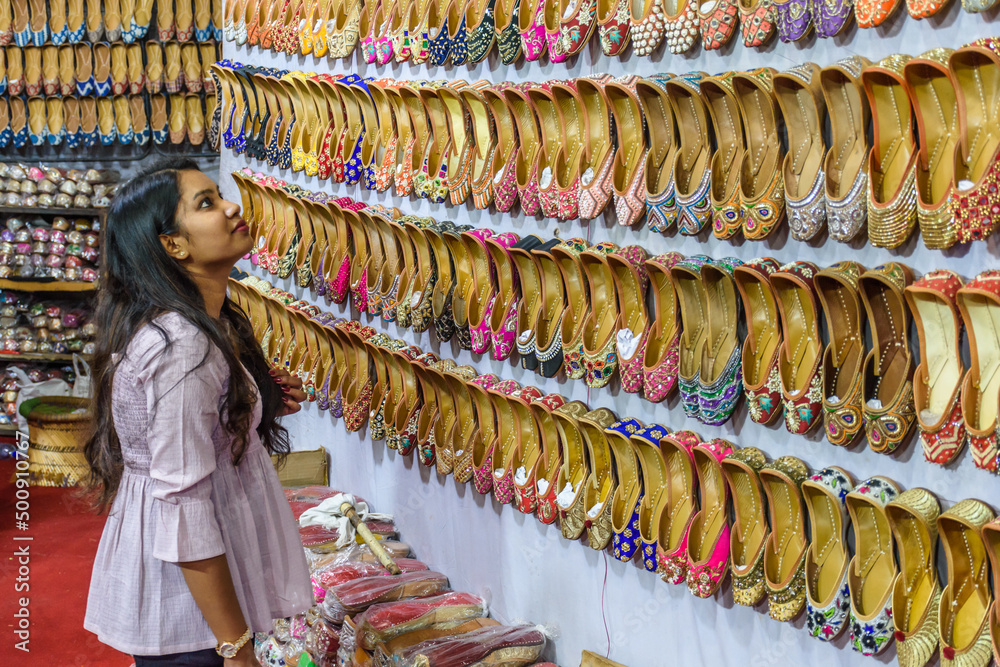 Indian woman shopping at Dilli haat in New Delhi Stock Photo | Adobe Stock