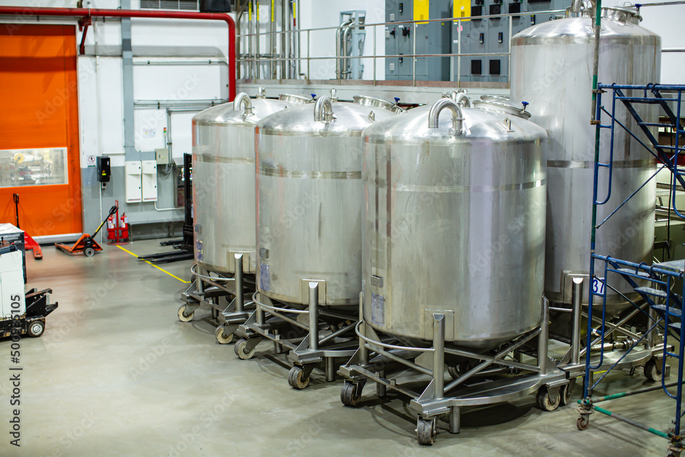 Stainless vertical steel tanks with equipment tank chemical cellar at ...