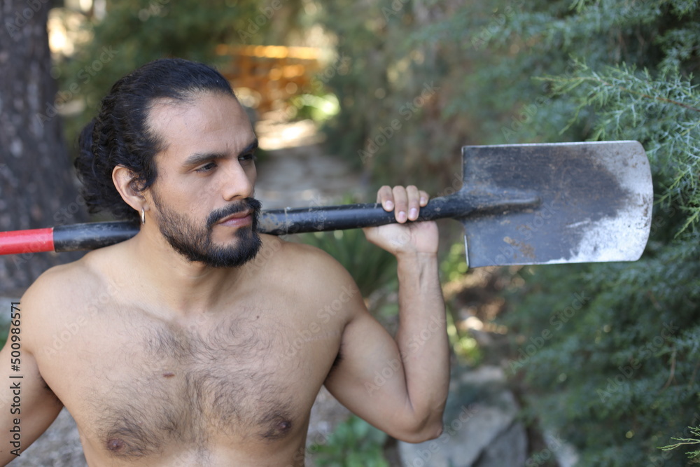 Sexy shirtless man using a shovel Stock Photo | Adobe Stock
