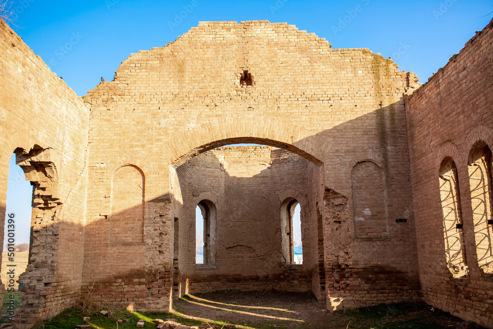 Old ruined church. Bent crosses and broken walls of the temple, ancient ...