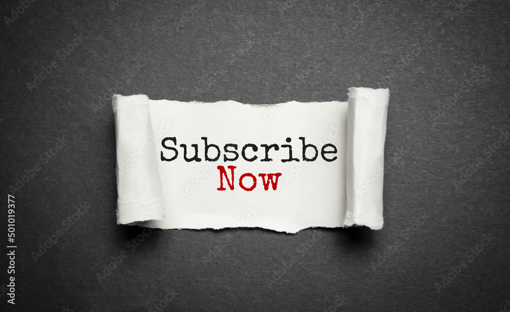 Text SUBSCRIBE NOW appearing behind torn brown paper. Top view. Stock ...