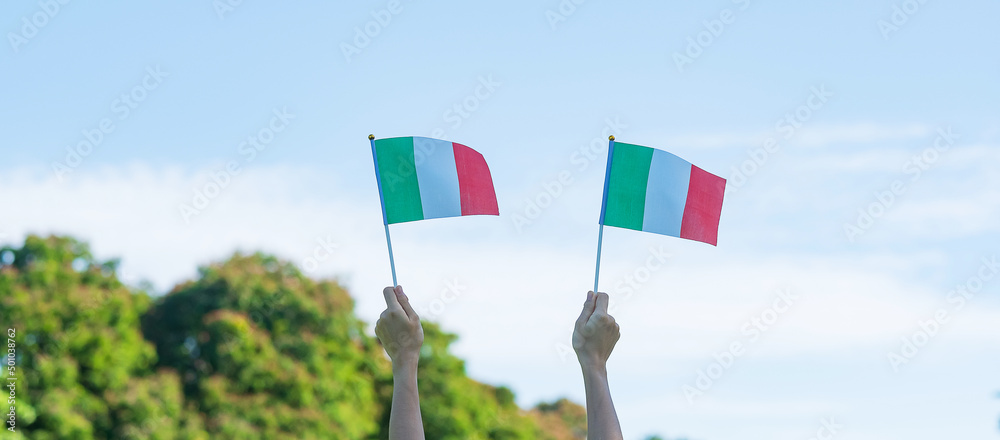 hand holding Italy flag on nature background. National Day, Republic ...