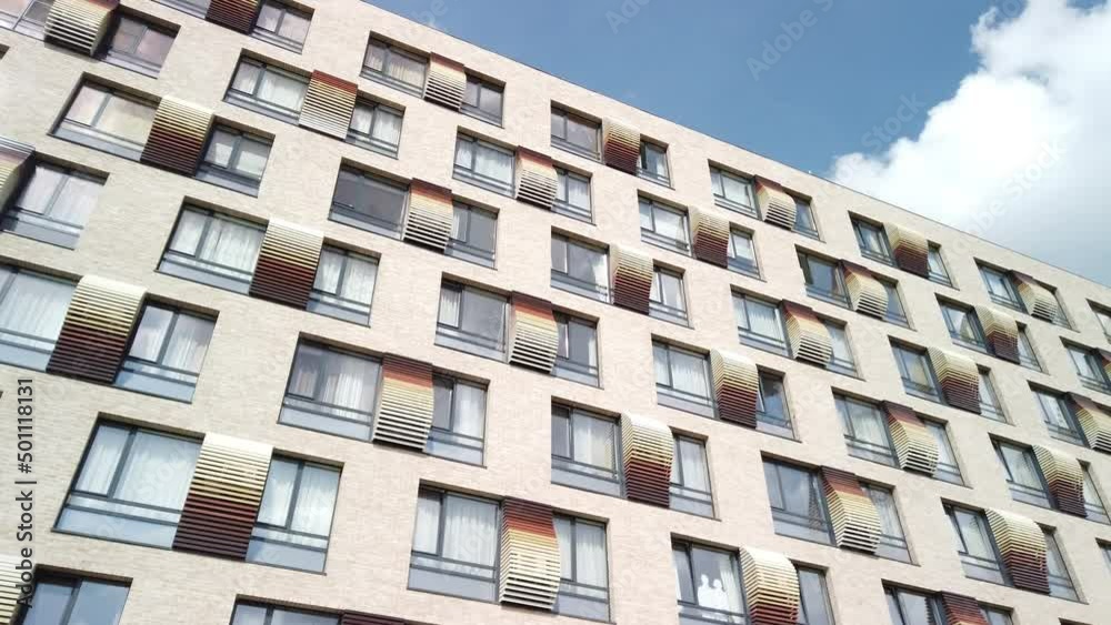 Exterior of a high-rise multi-story apartment building - facade ...