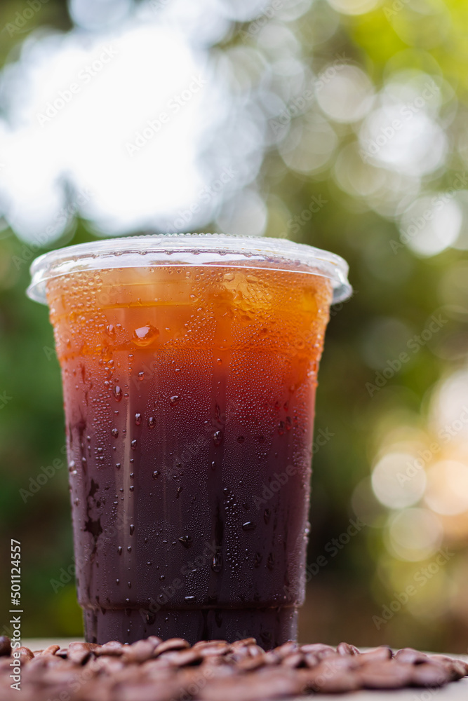 Iced Coffee espresso caffeinated beverage is placed on counter at ...