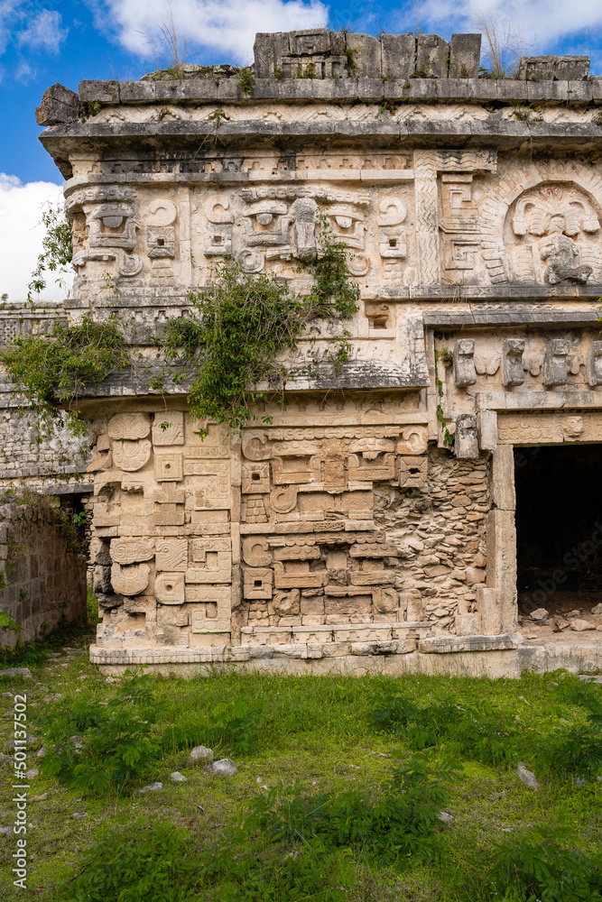 Element of the wall with bas-relief ornaments of temple at Chichen Itza ...
