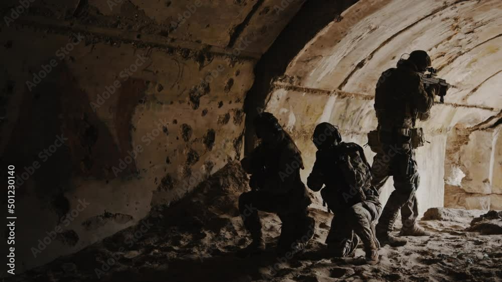 Built up tunnel channel having sneaky squad of commandos. High quality ...