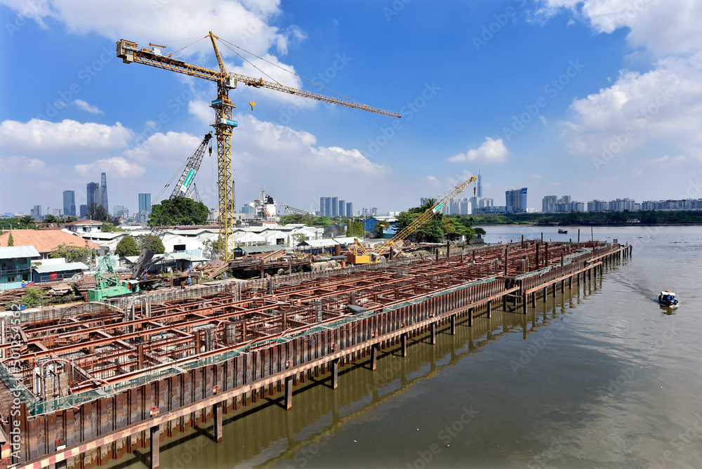 Large construction in the river for urban flood prevention. Industry ...