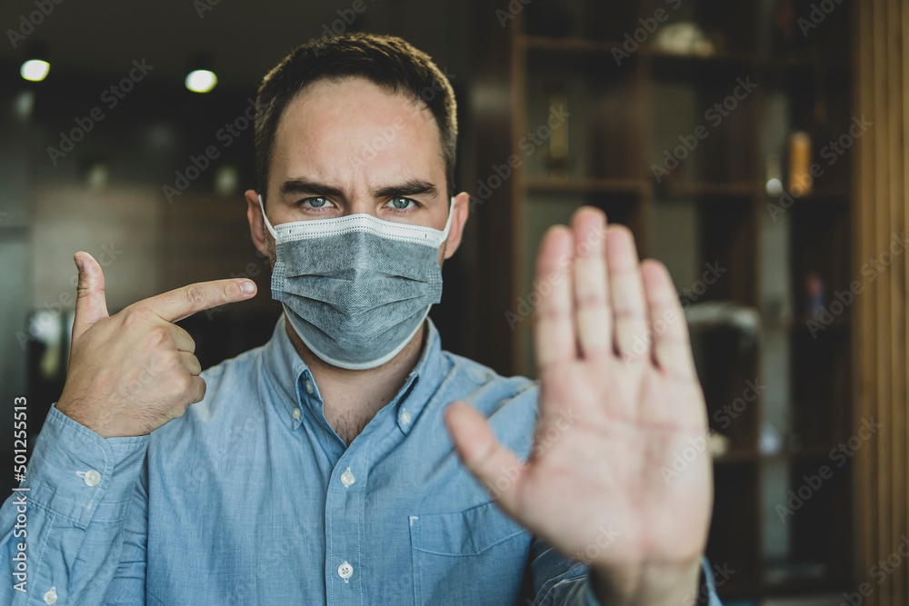 Mandatory wearing of a mask in a public place. The evil guard forbids ...