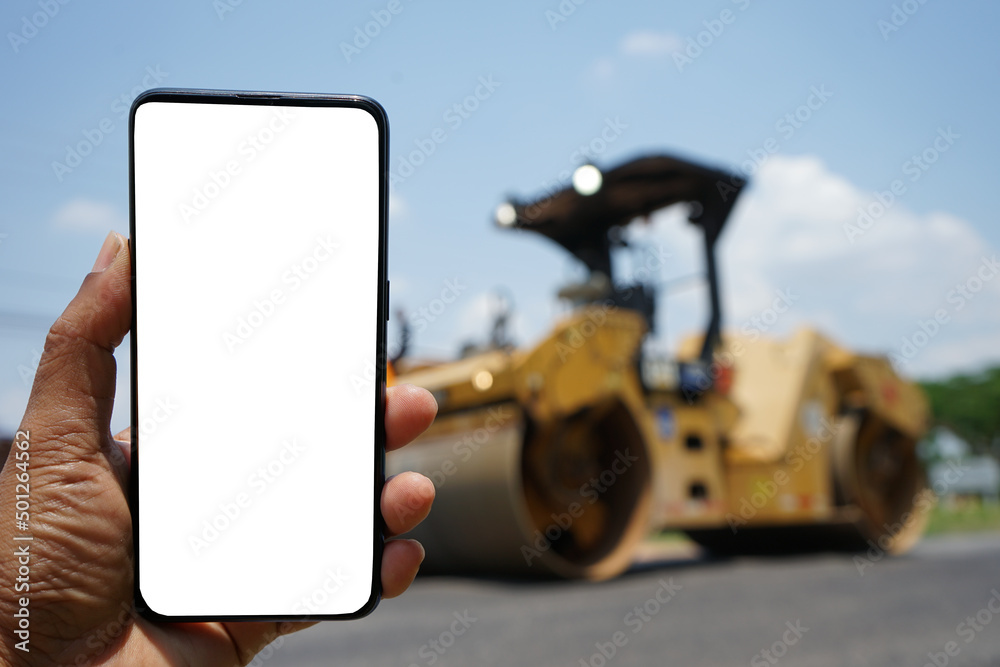 Mobile phone and road construction blur background Stock Photo | Adobe ...