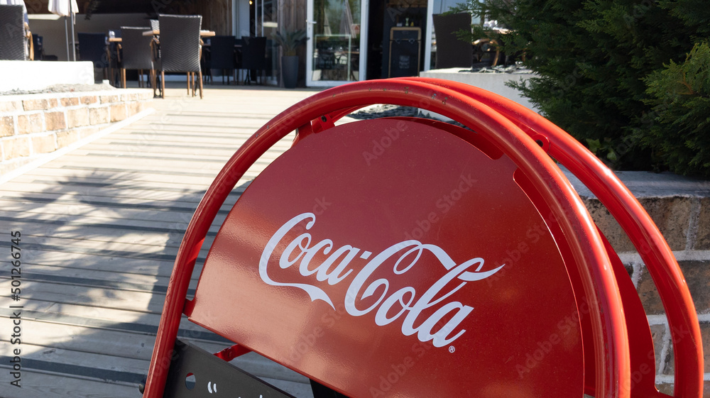 Coca Cola sign logo and brand text on coffee terrace cafe of classic ...