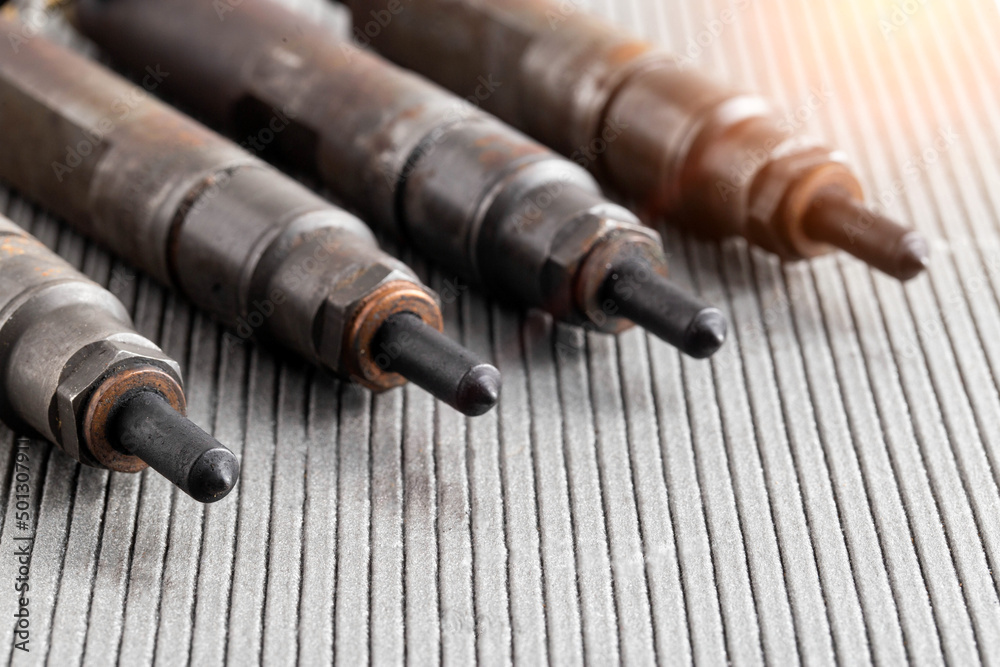 Mechanical injectors from a diesel engine, close-up. Fuel atomization ...
