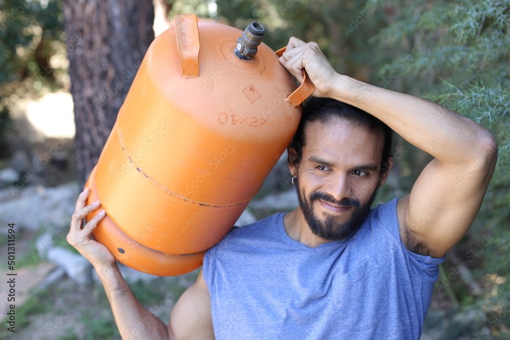 Propane tank delivery man with attractive look Stock Photo | Adobe Stock