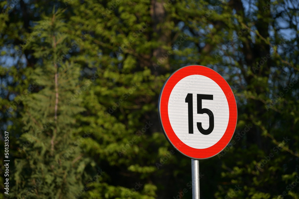 Traffic sign indicator showing the maximum speed limit at 15 kmh ...