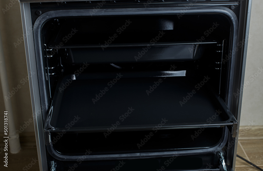 modern gas oven front view. Open oven. Steel gas oven. modern kitchen ...