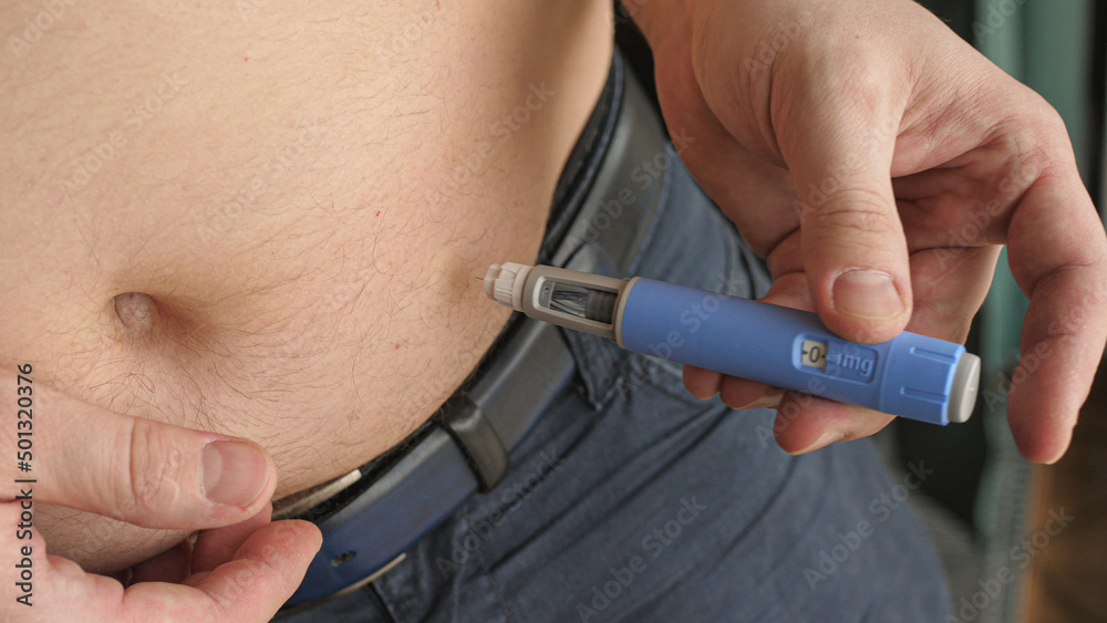obese fat man injecting Semaglutide Ozempic injection control blood ...