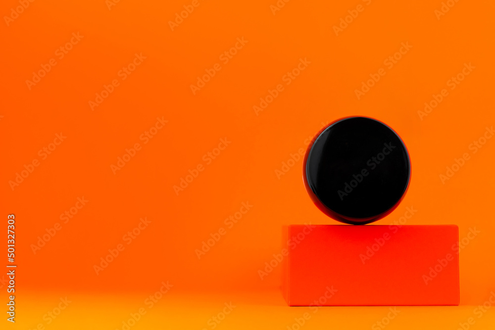 Cosmetic tonal foundation black jar mockup on geometrical podium orange ...