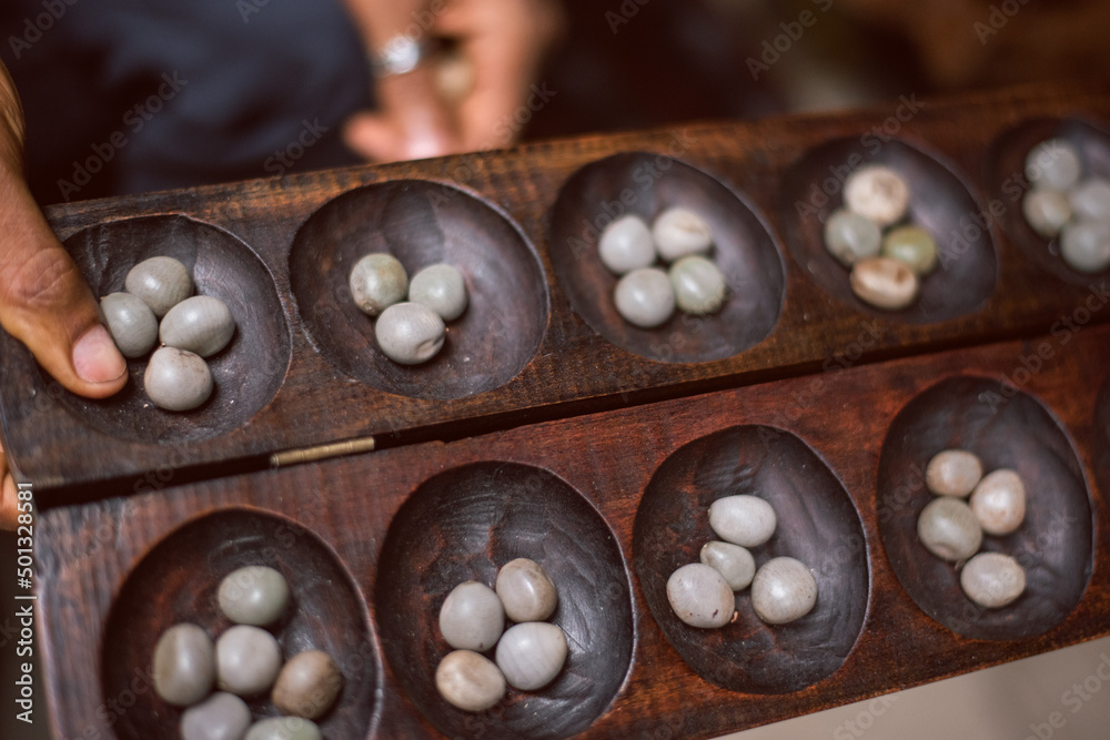 A local board game called ayo - Lagos, NIGERIA, April 12 2022. Nigerian ...