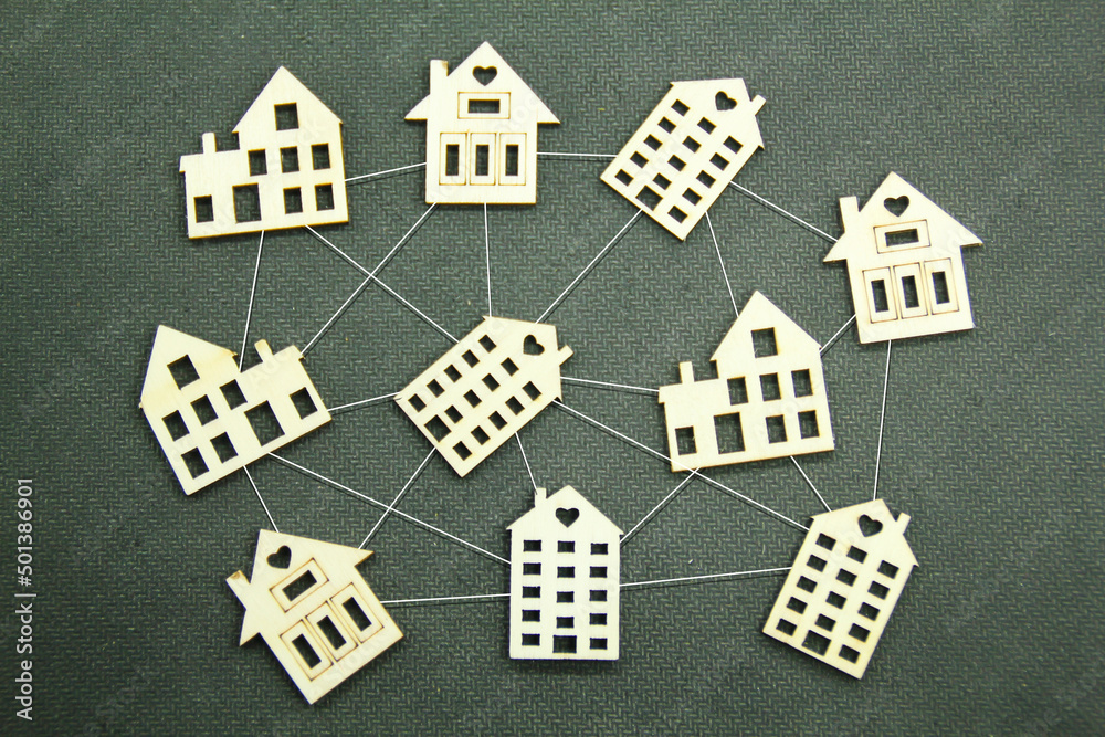 the shape of a small wooden house with connections between houses ...