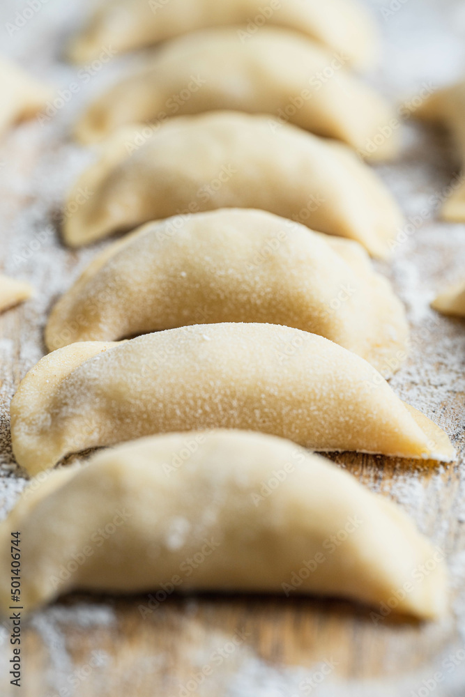 Ukrainian traditional food varenyky. varenyky with fried cabbage and ...