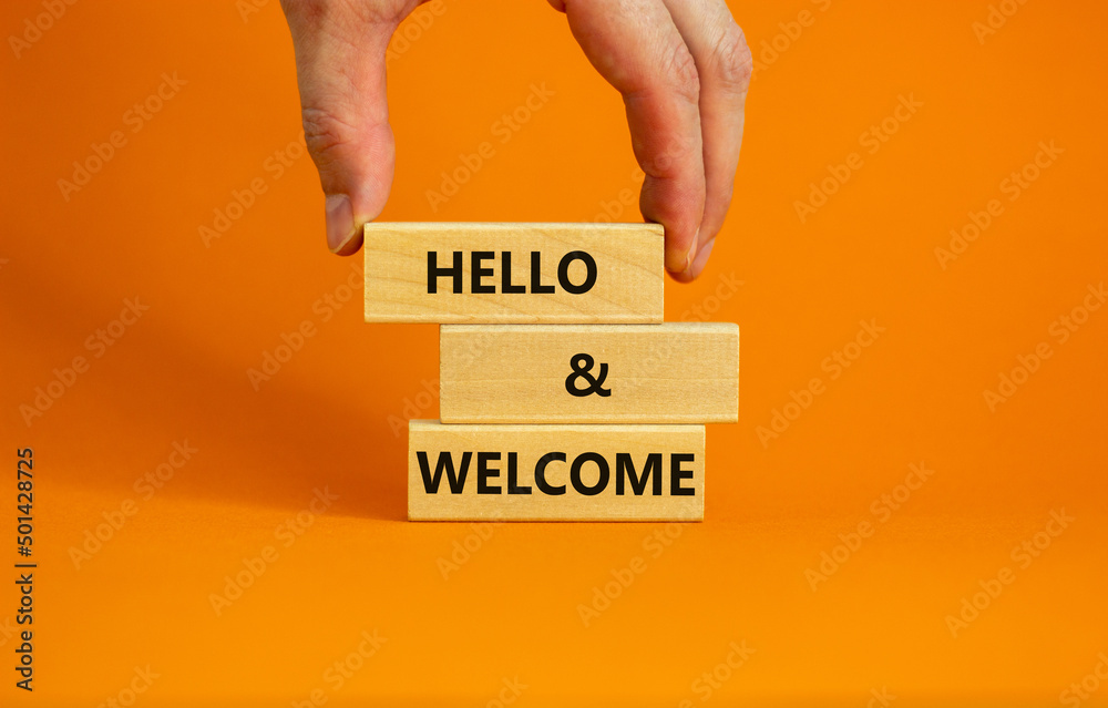 Hello and welcome symbol. Concept words Hello and welcome on wooden ...